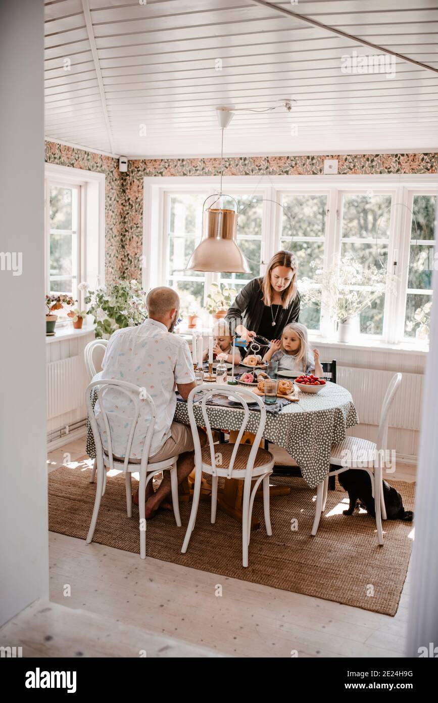 Family having meal together Stock Photo - Alamy