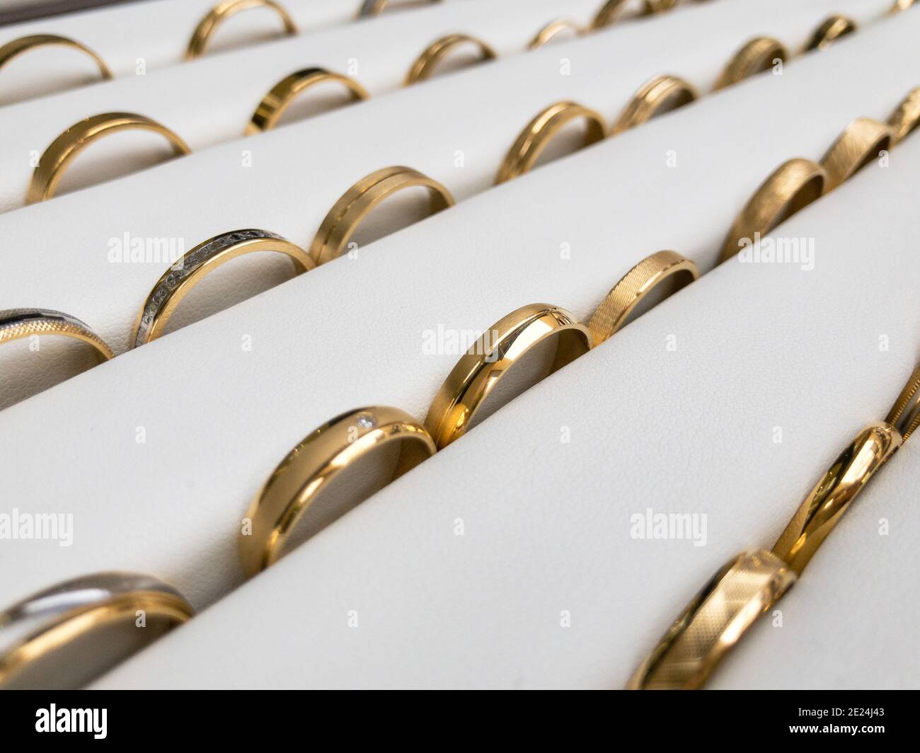 Gold wedding rings demonstration display perspective Stock Photo - Alamy
