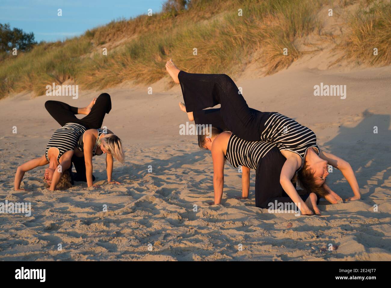 Group of women dancing dance contact improvisation in nature Stock ...