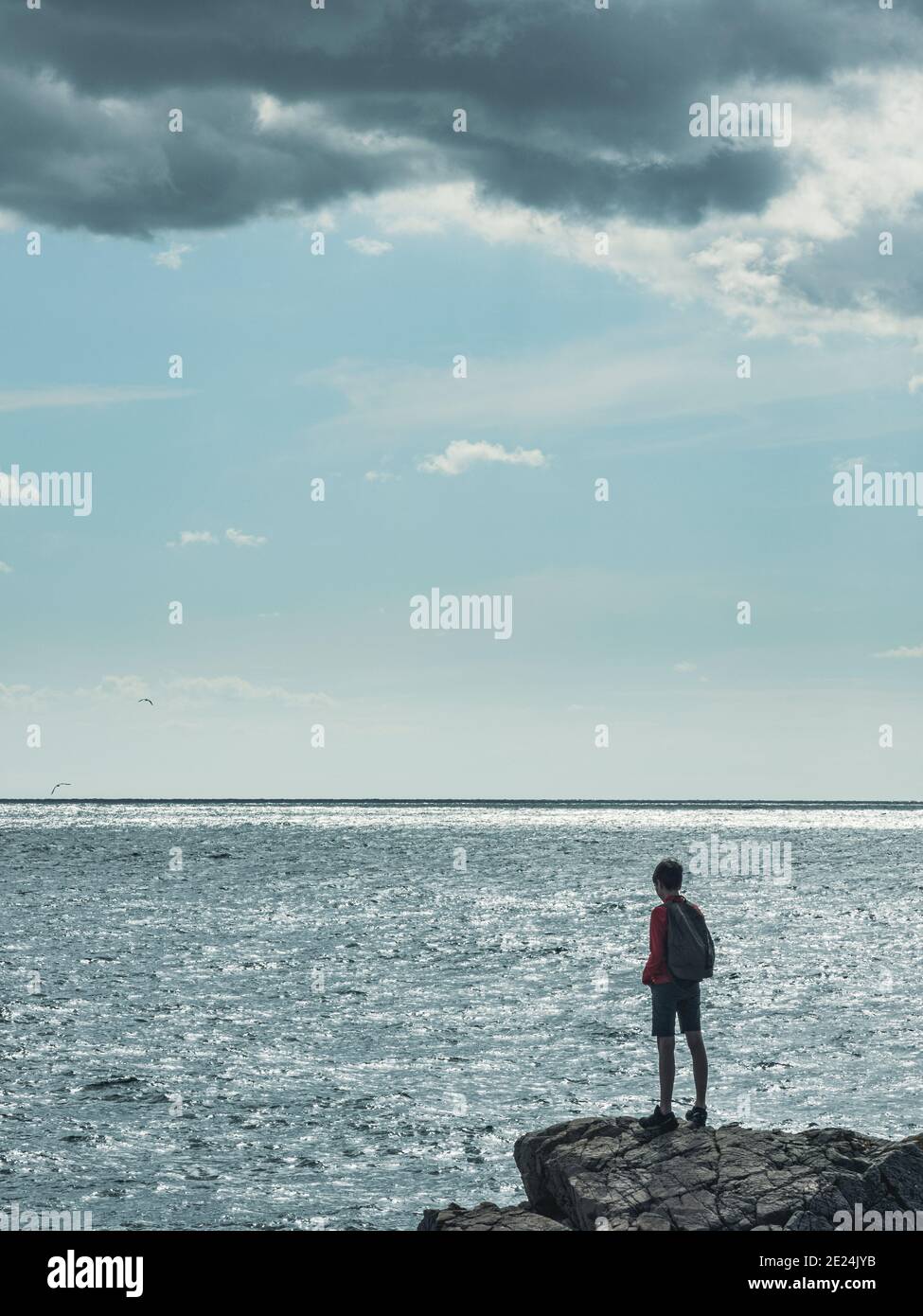 Silhouette of person at sea Stock Photo - Alamy
