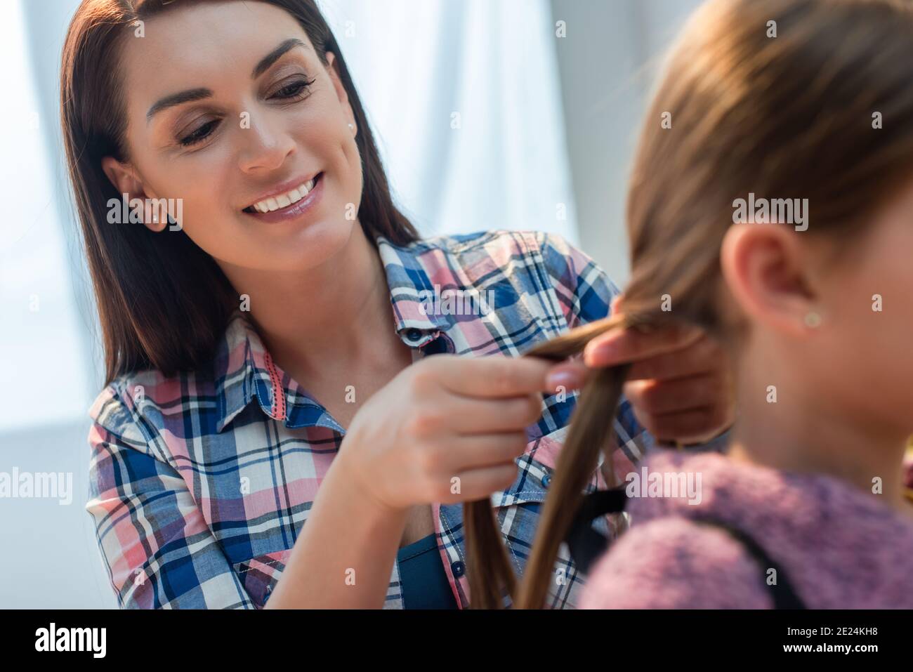 Plaiting hair hi-res stock photography and images - Alamy