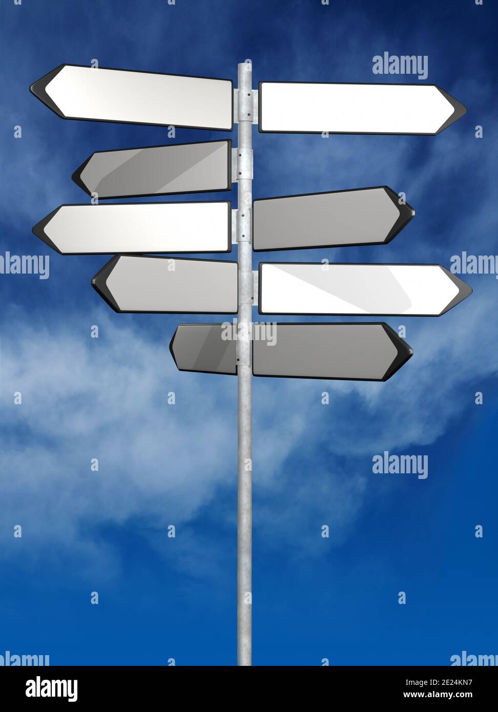 white directionl signs on a blue sky background Stock Photo - Alamy