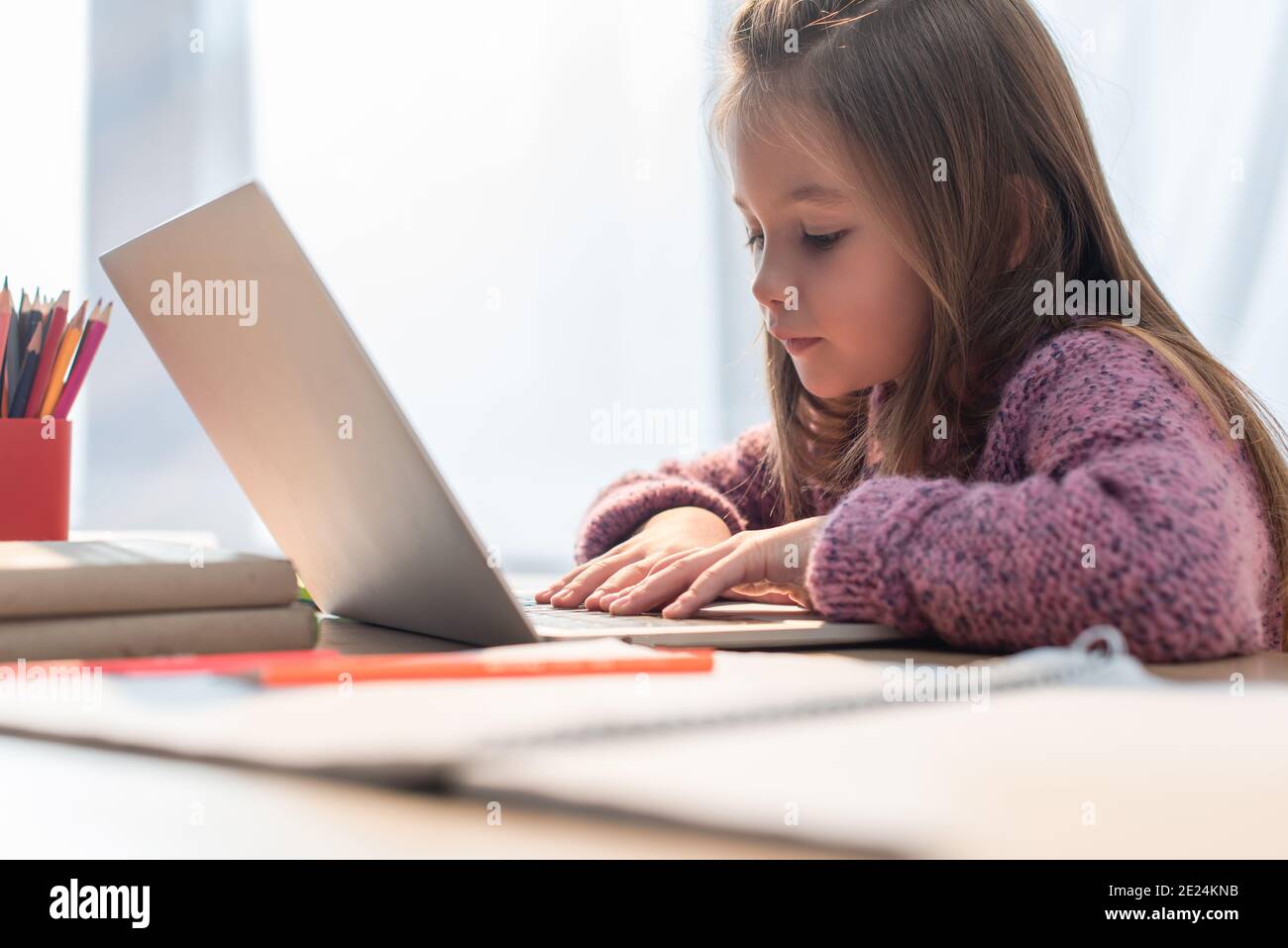 Beautiful girl typing on computer hi-res stock photography and images ...