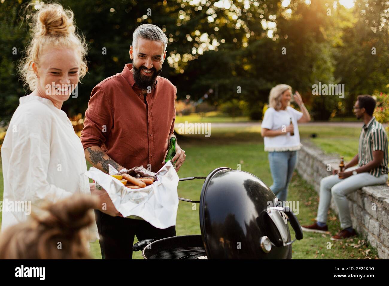 Happy friends barbecue party in hi-res stock photography and images - Alamy