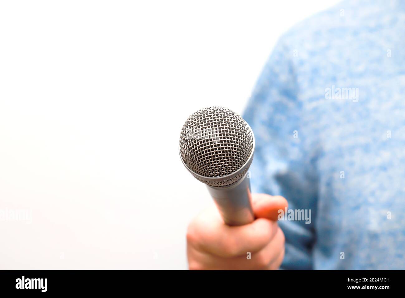 Speaker with mic in conference hi-res stock photography and images - Alamy