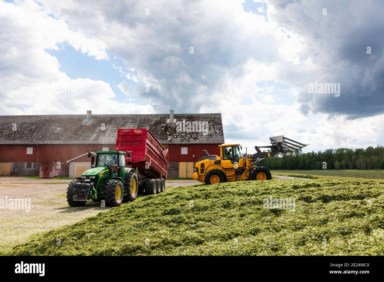 Machinery preparing silage Stock Photo - Alamy