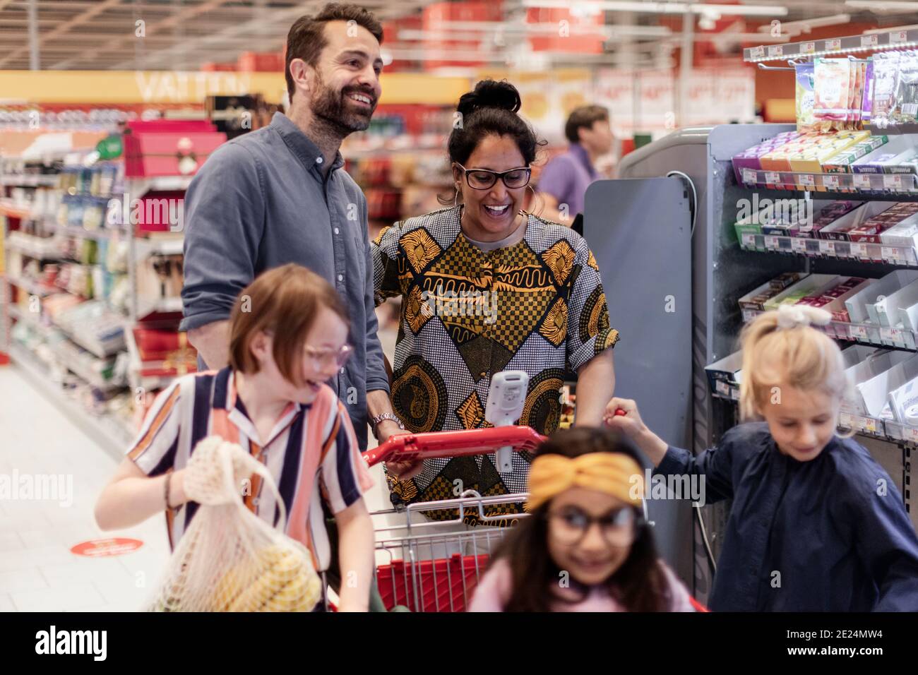 Family doing shopping in supermarket Stock Photo - Alamy