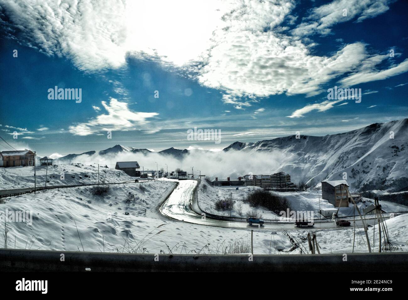 Road through snowy landscape in Caucasus mountains, Georgia Stock Photo ...