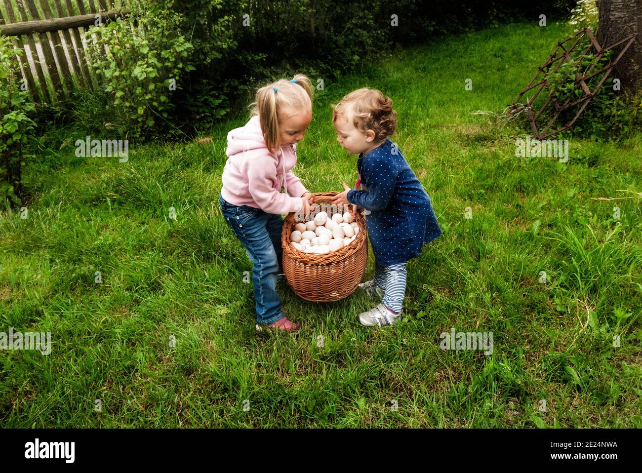 Children collecting eggs hi-res stock photography and images - Alamy