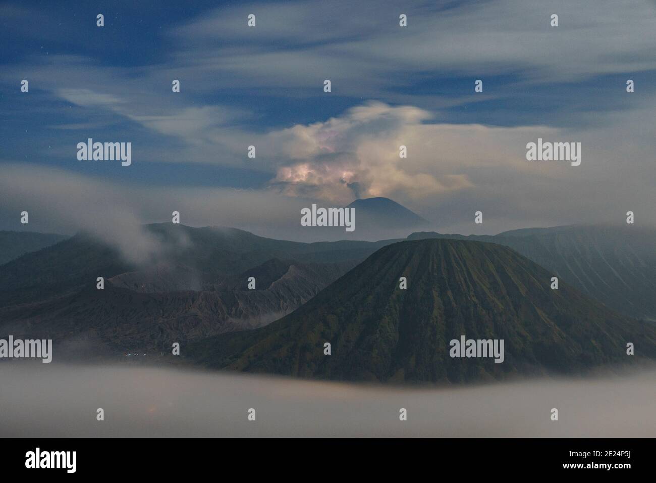 Mount Bromo through the clouds, East Java, Indonesia Stock Photo - Alamy