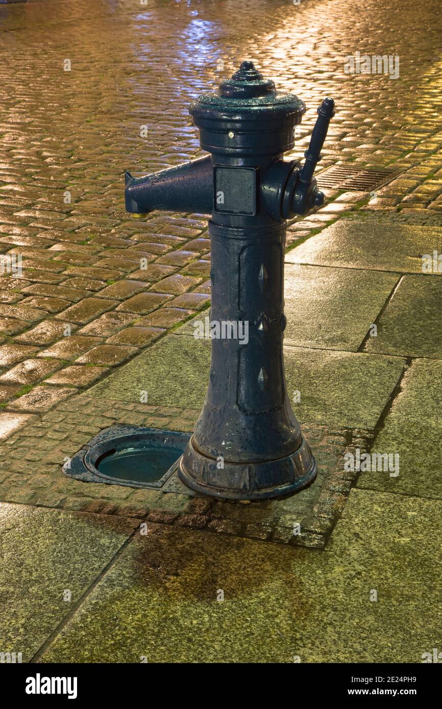 Standpipe at Market square in Torun. Poland Stock Photo - Alamy