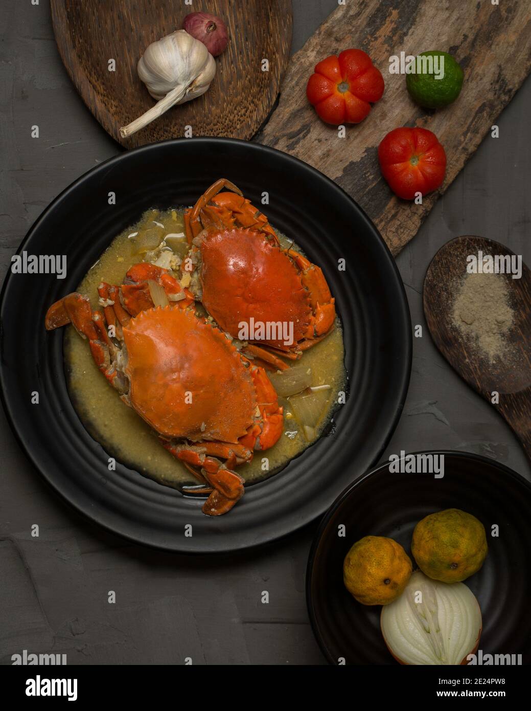 Overhead view of butter crab surrounded by fresh ingredients Stock ...
