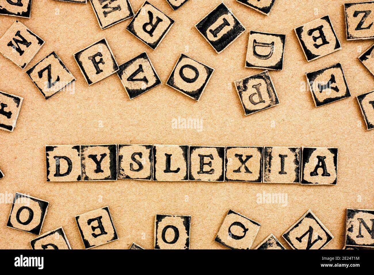 Word Dyslexia spells out from cardboard letters made by black alphabet ...