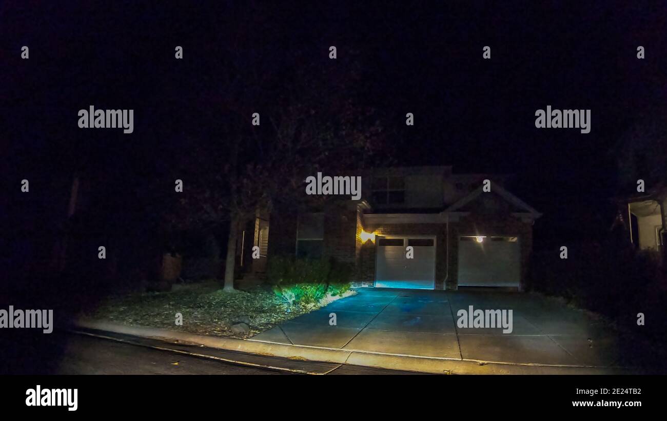 Driving on typical paved roads in a suburban upscale residential ...