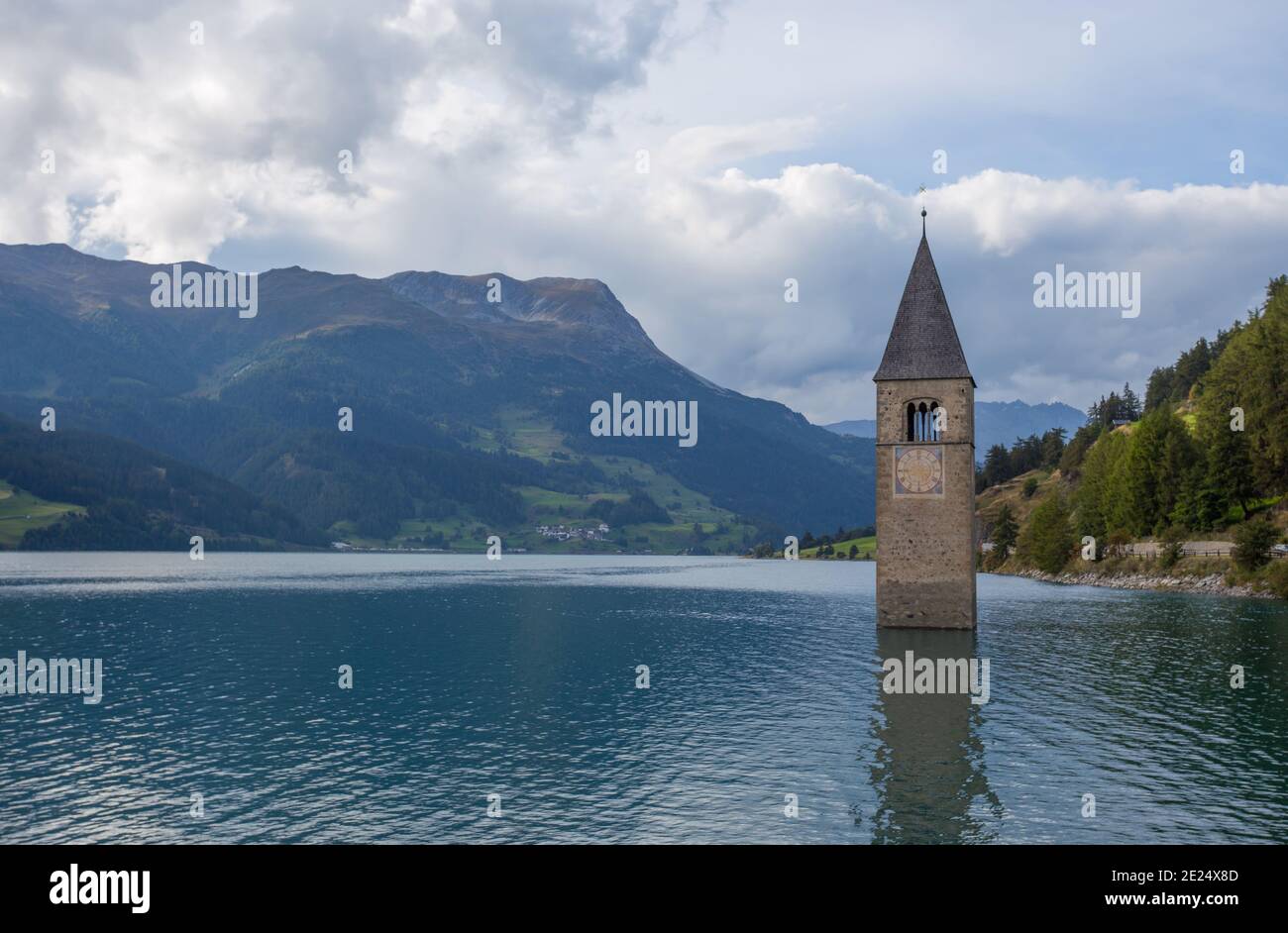 Old church tower of graun in the lake reschensee hi-res stock ...