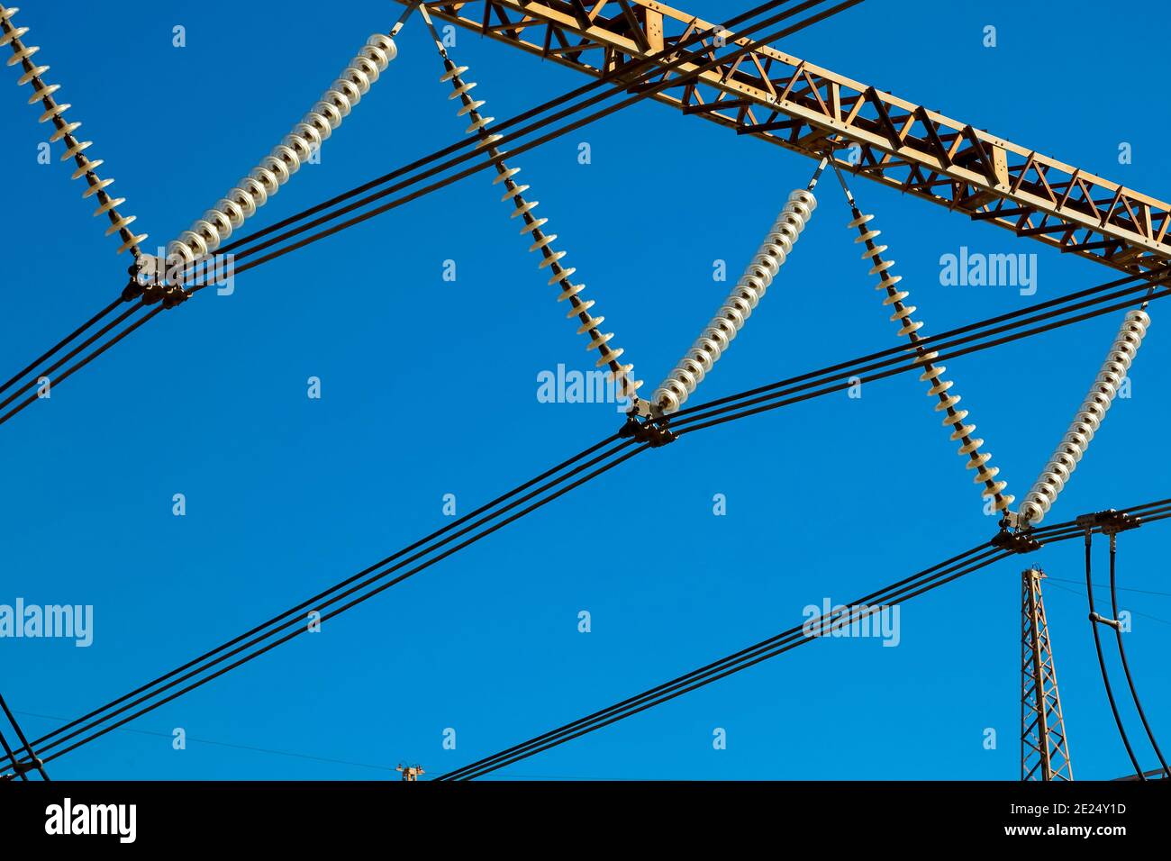Power line against blue sky and sun power lines hi-res stock ...