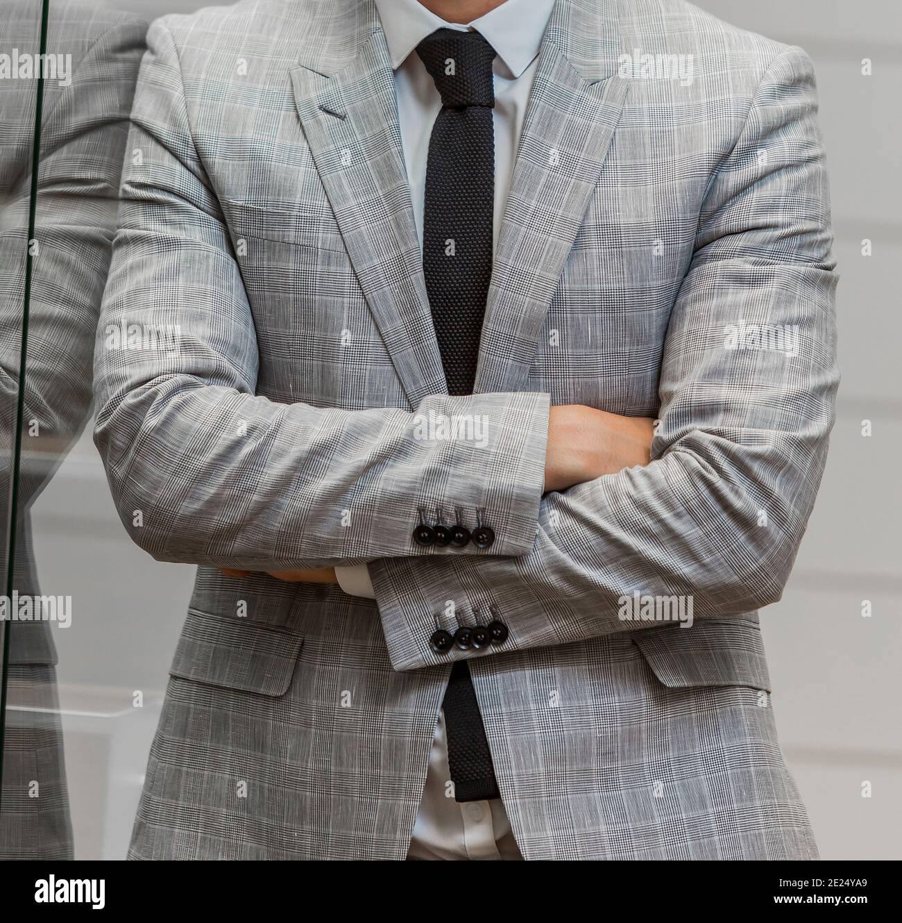 Mid-section of a professional businessman in an elegant suit and tie ...