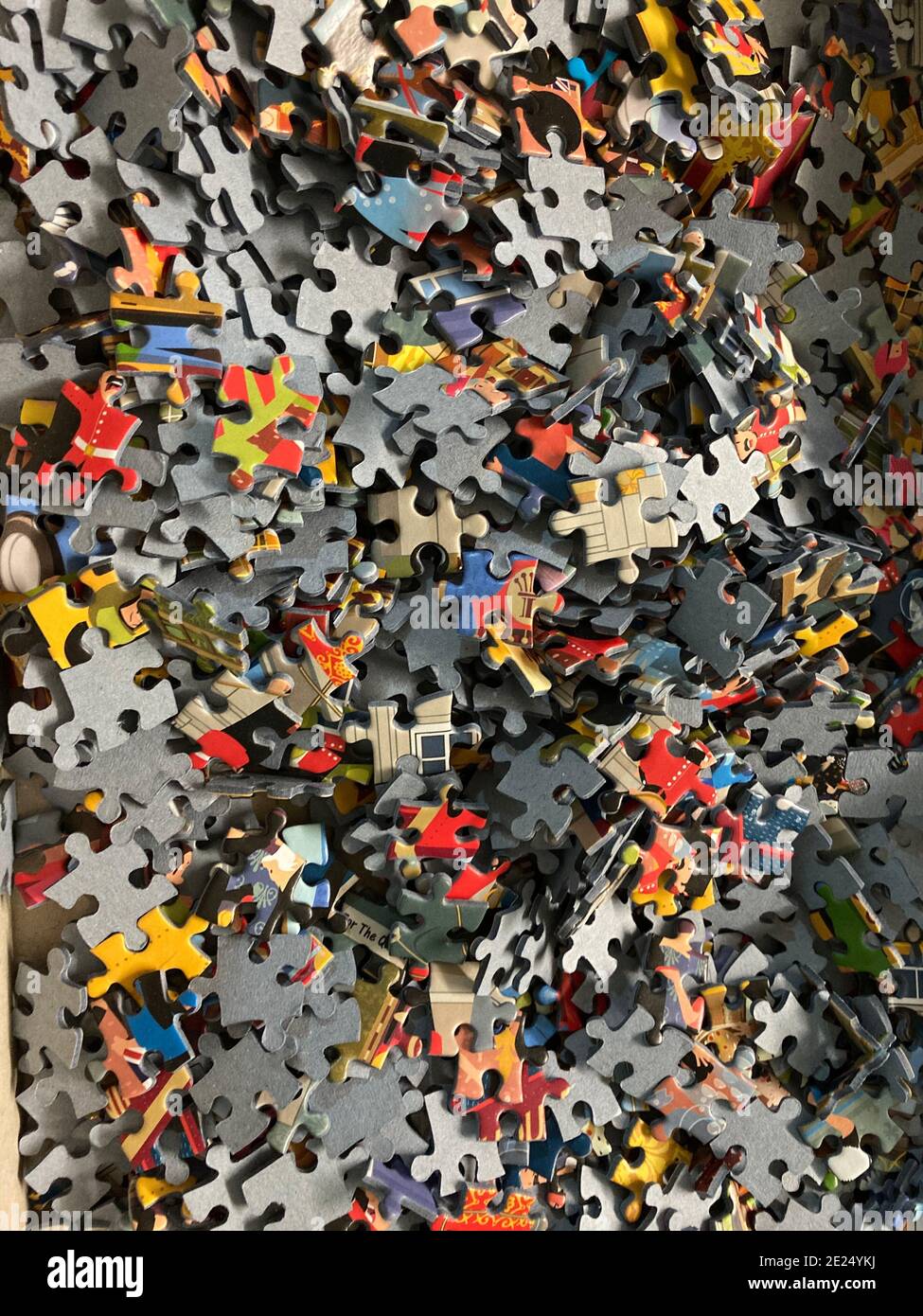 Pile of jigsaw puzzle pieces Stock Photo - Alamy