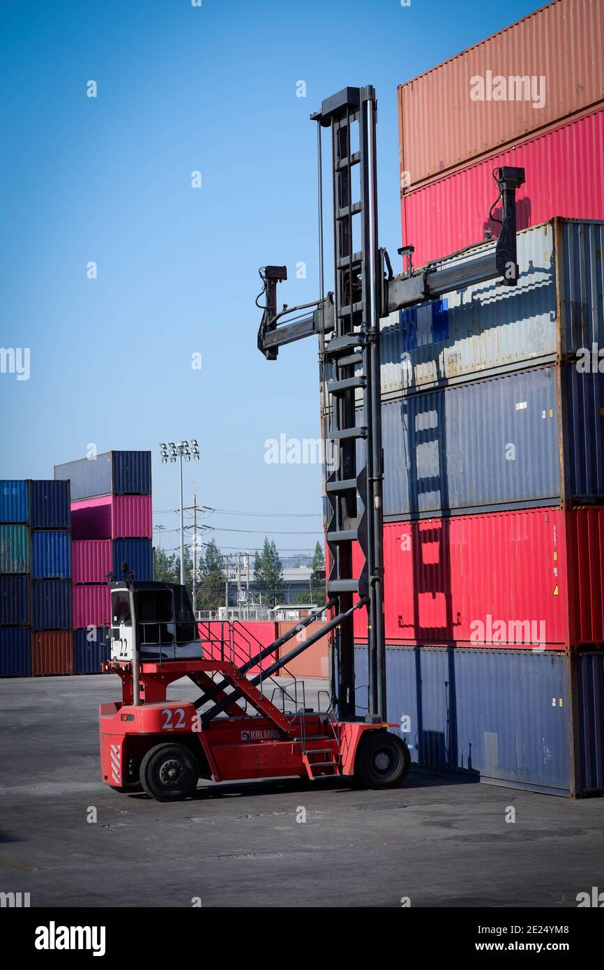 Container handlers In the container yard Stock Photo - Alamy