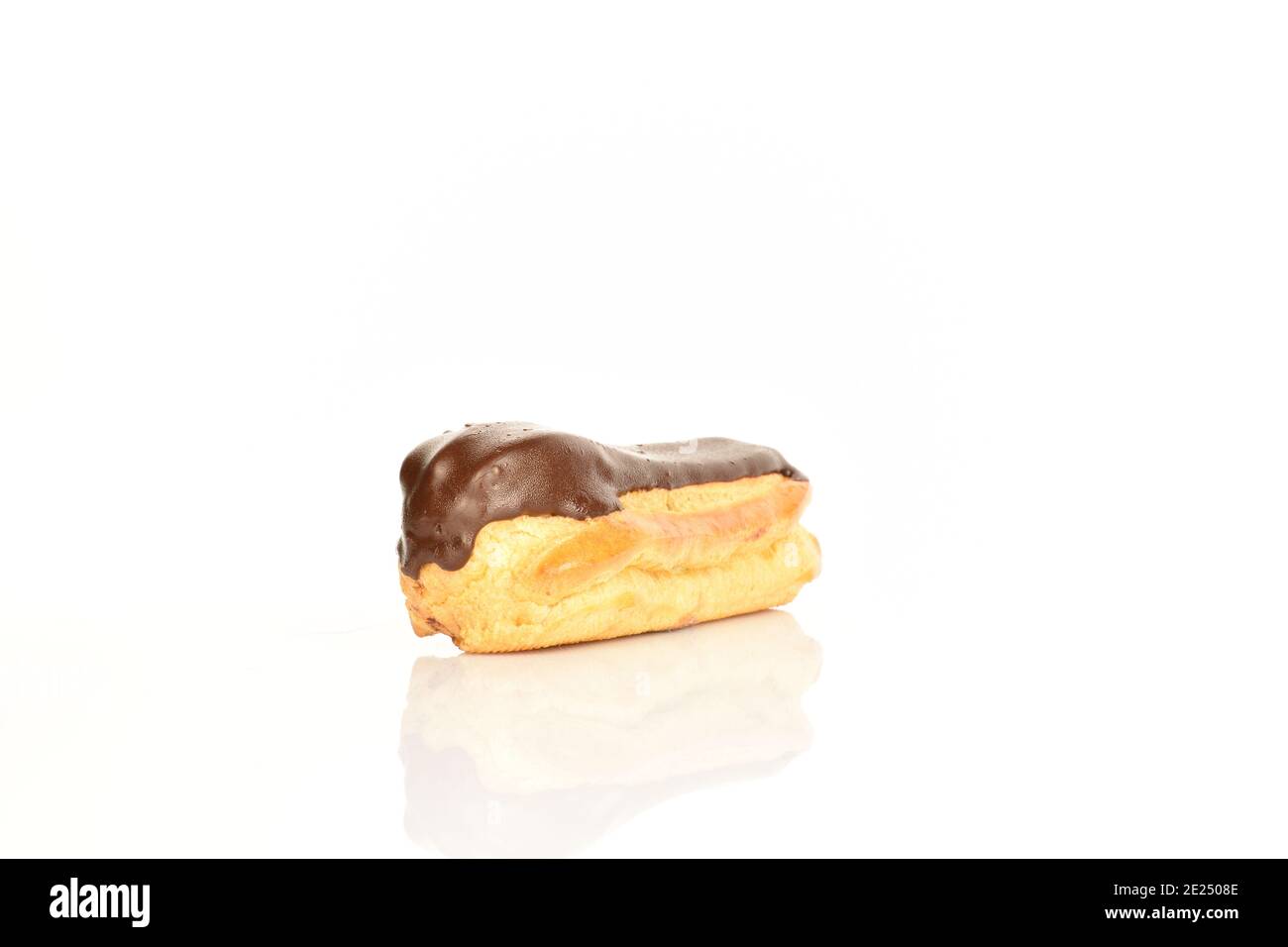 One chocolate eclair, close-up, isolated on white Stock Photo - Alamy