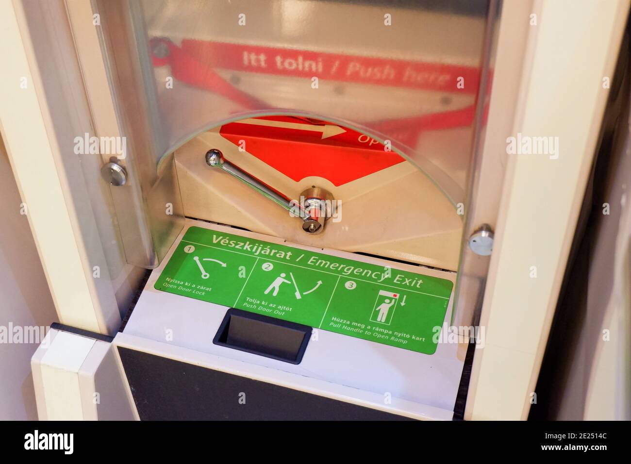 Emergency exit with guide pictograms in a subway car metro line 4. in ...