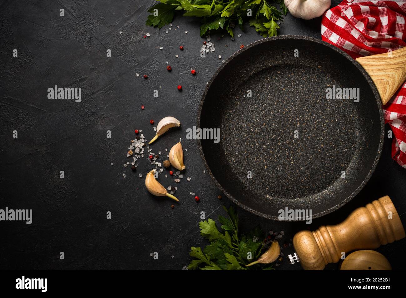 Food cooking background on black table Stock Photo - Alamy
