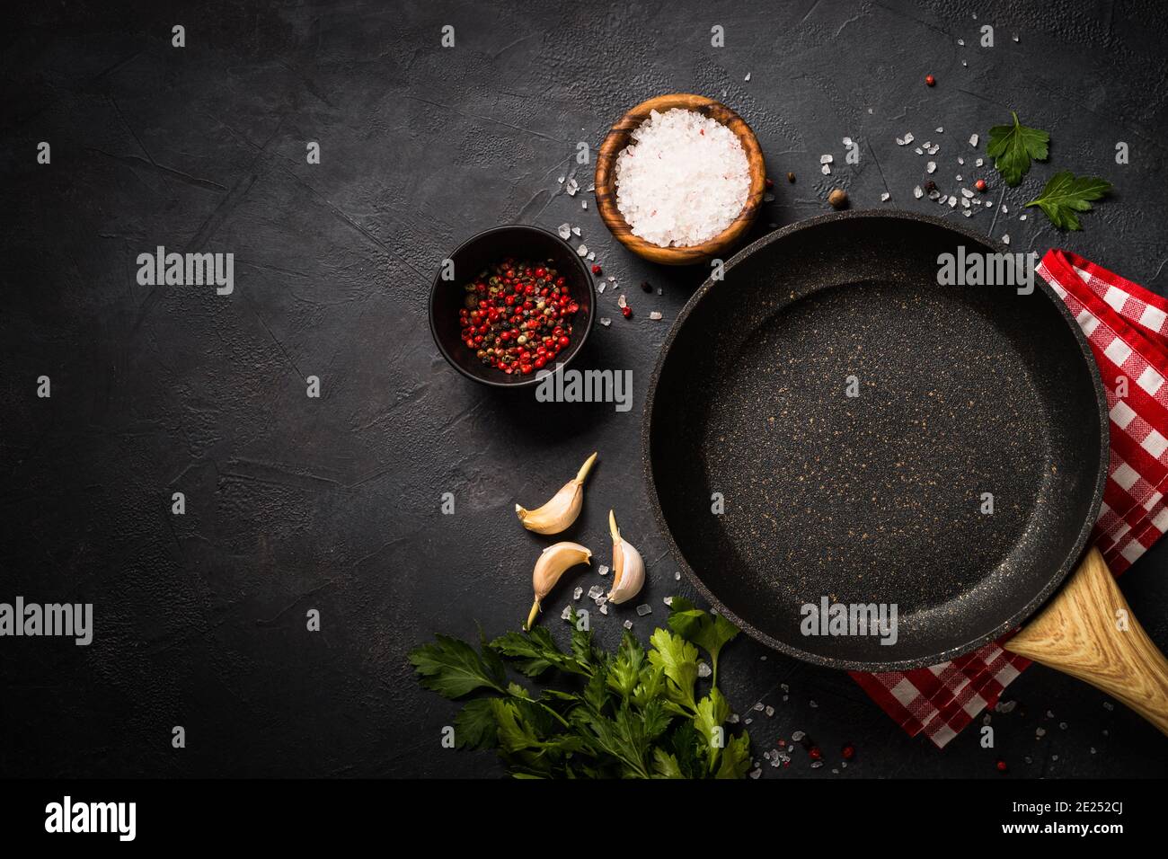 Food cooking background on black table Stock Photo - Alamy