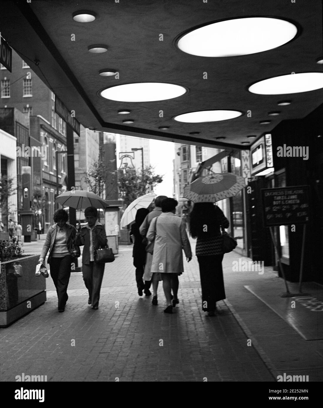 People are walking down the street. Philadelphia, USA, 1976 Stock Photo ...