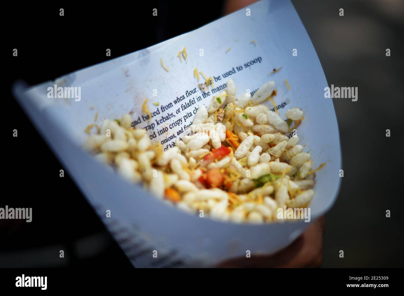 Selective focus shot of Masala Mudhi or muri - a famous street food ...