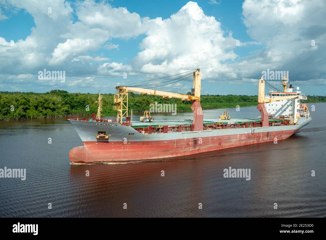 Multipurpose cargo ship underway in river delivering bulk cargo for ...