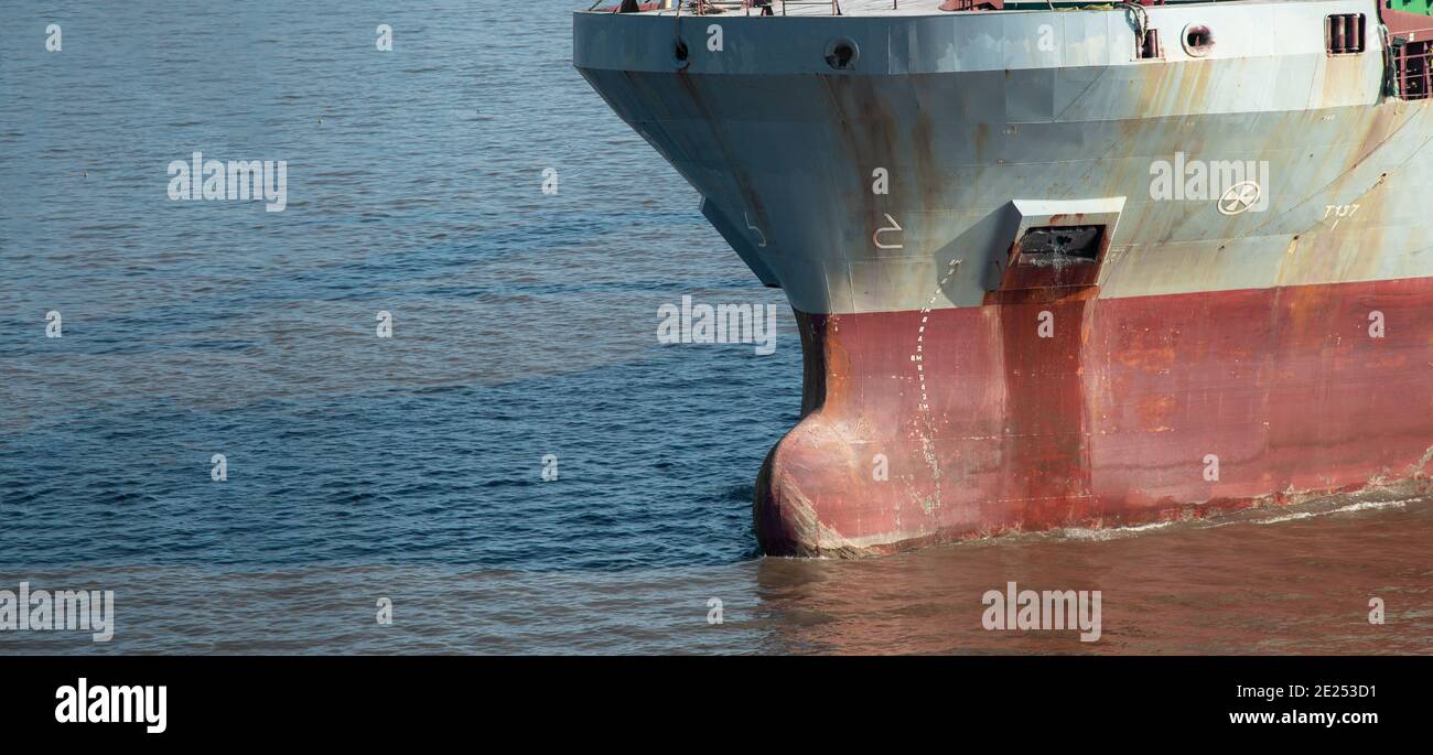 Closeup of multipurpose ship bulbous bow underway. Front view Stock ...