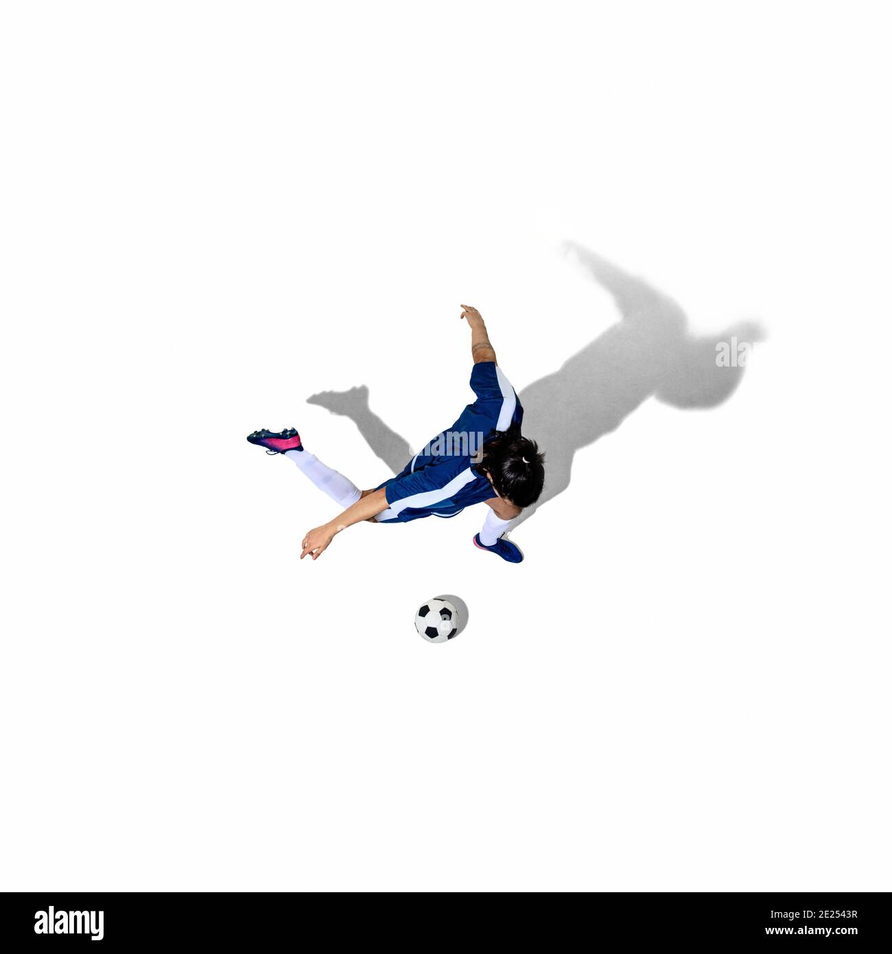 Young man soccer player isolated over white background with shadow. Top ...