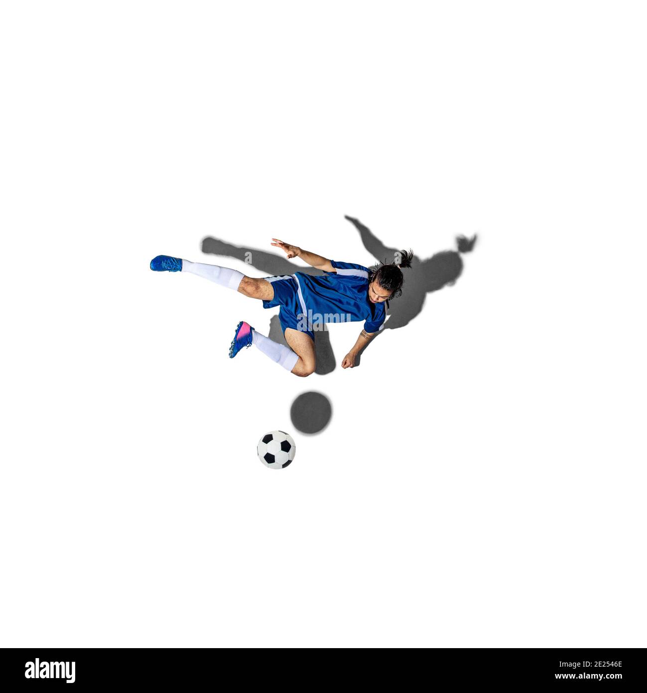 Top view of young man soccer player isolated over white background with ...