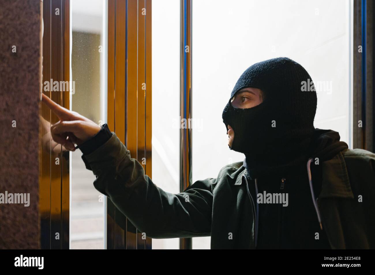 Ringing door bell mask hi-res stock photography and images - Alamy