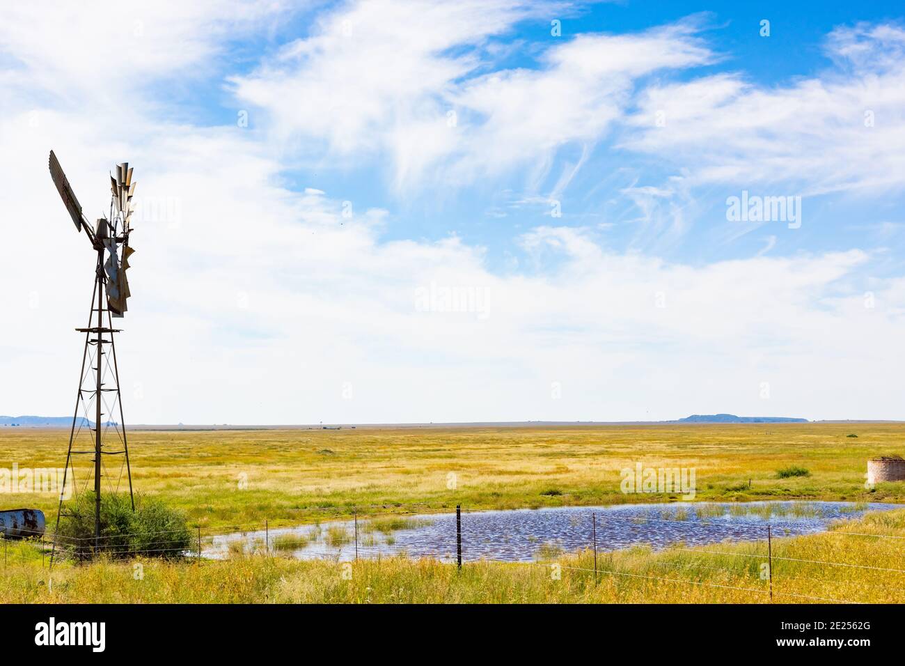 Swamp and a wind engine under the cloudy sky in South Africa Stock ...