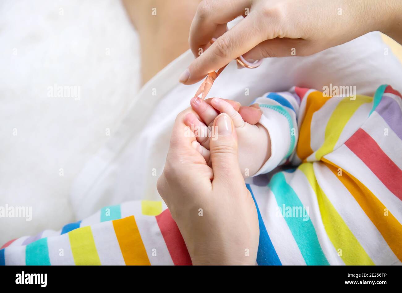 Mother cuts nails hi-res stock photography and images - Alamy