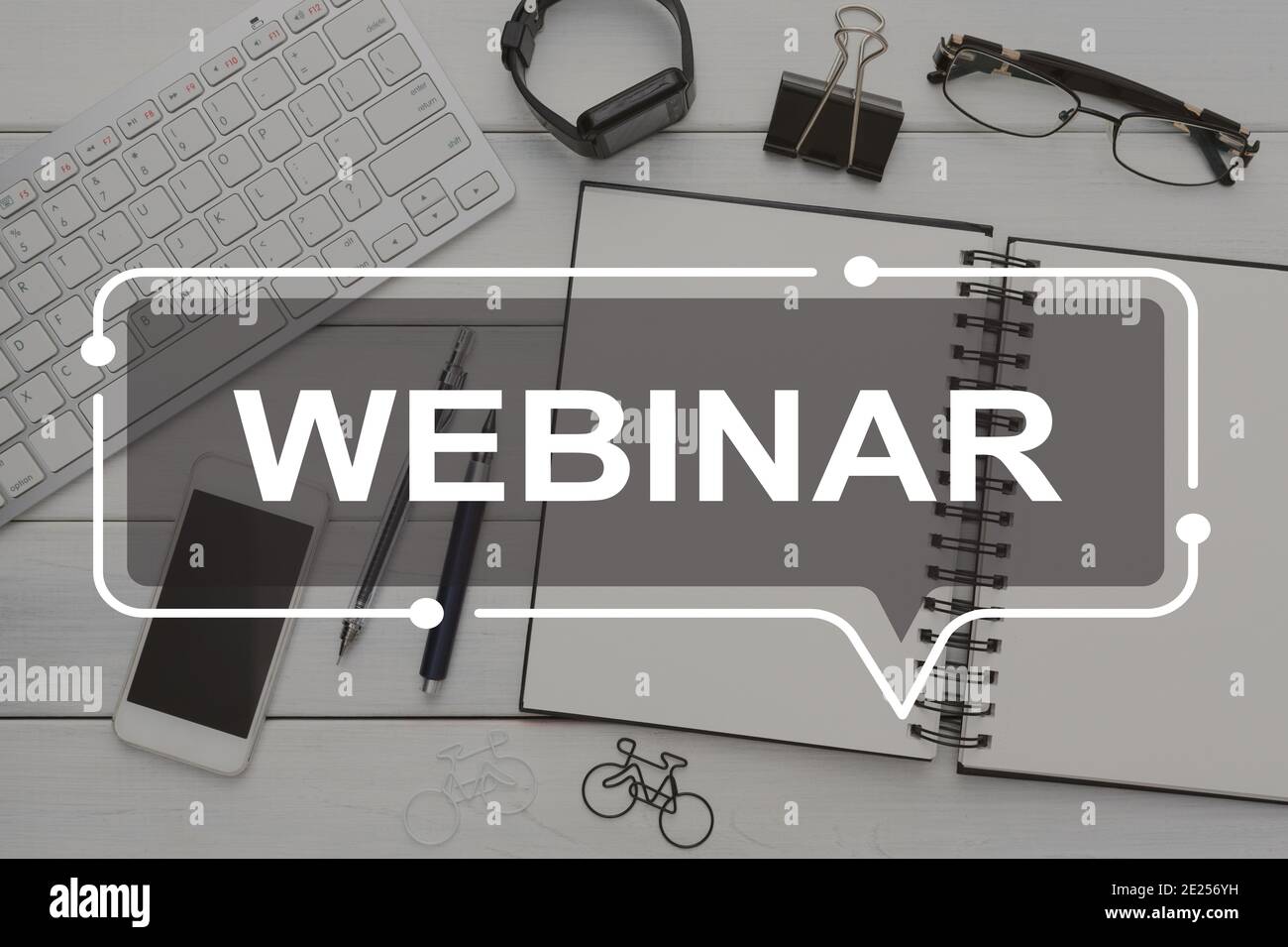 Webinar inscription over workdesk background, creative image, black and ...