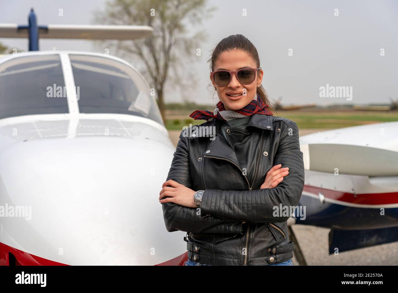 Female pilot smiling in cockpit hi-res stock photography and images - Alamy