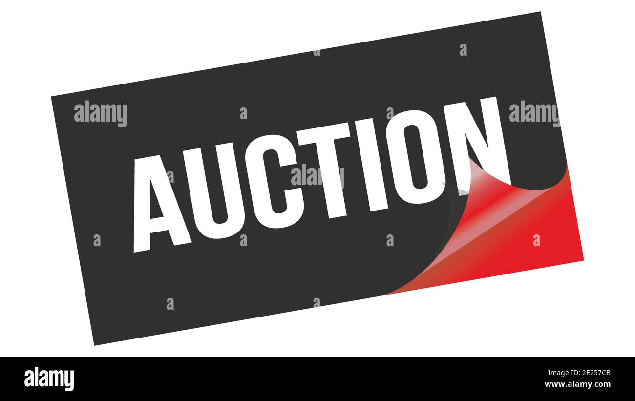 AUCTION text written on black red sticker stamp Stock Photo - Alamy