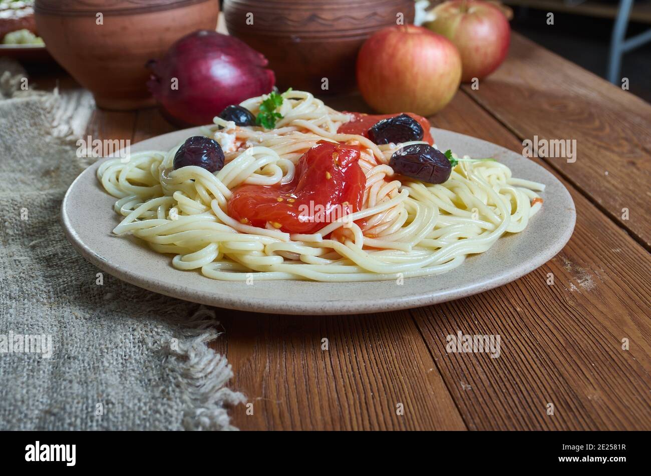 Italian pasta puttanesca tomato sauce hi-res stock photography and ...