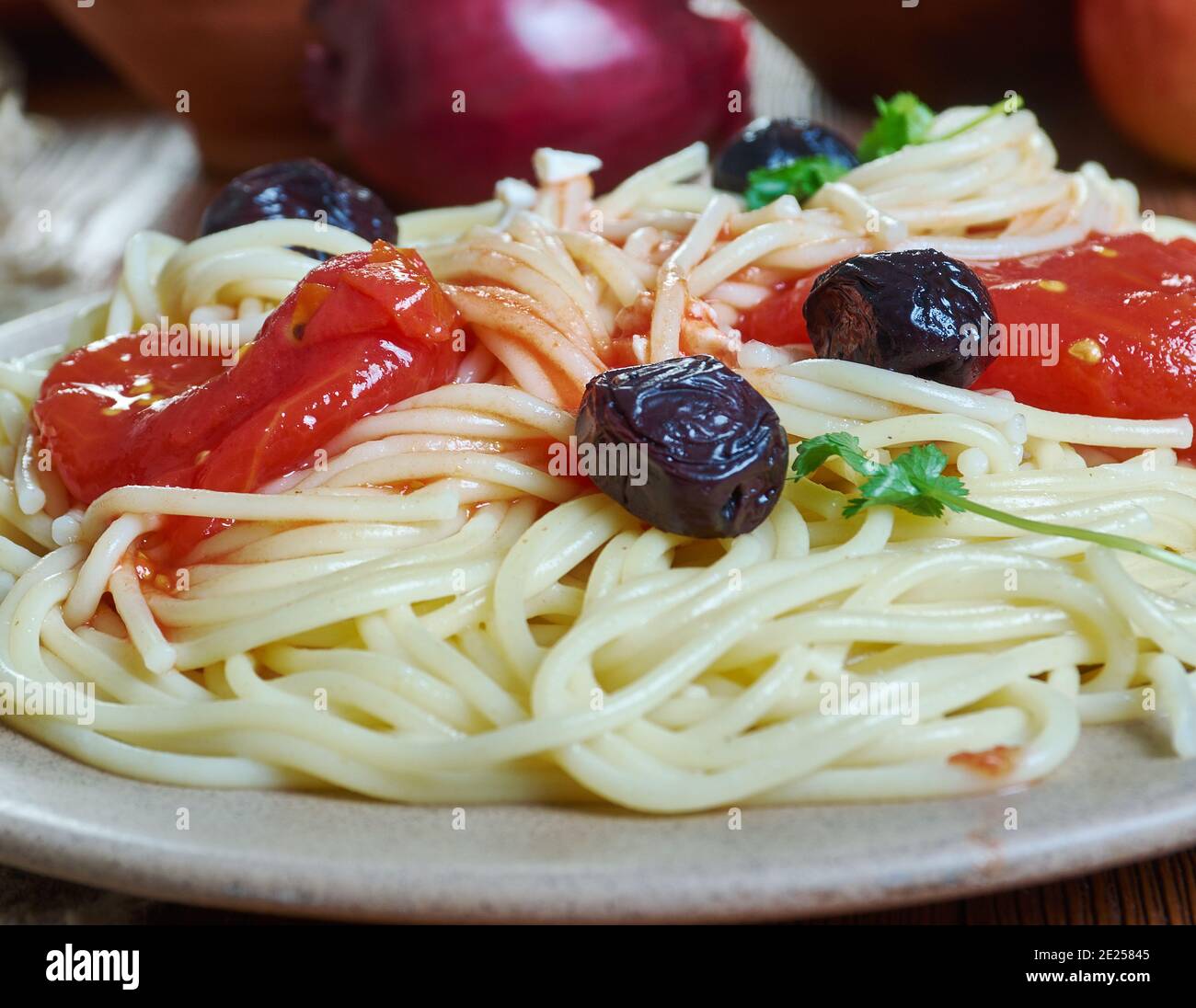 Pilchard puttanesca this tomato-based Italian pasta supper Stock Photo ...