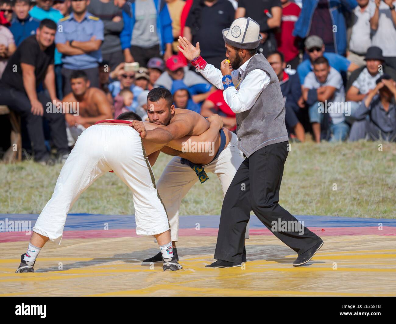 Kuresh, traditional Kyrgyz wrestling. Folk and Sport festival on the ...
