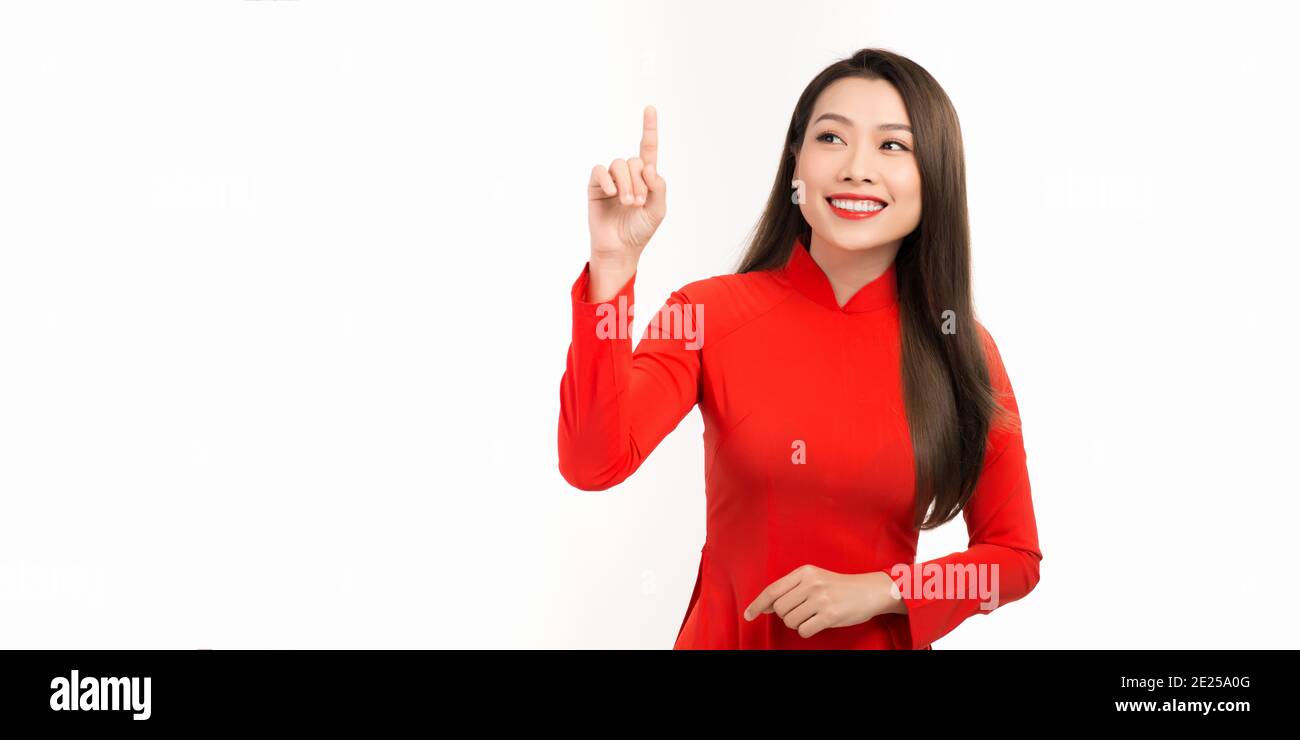 Woman with finger point up Stock Photo - Alamy