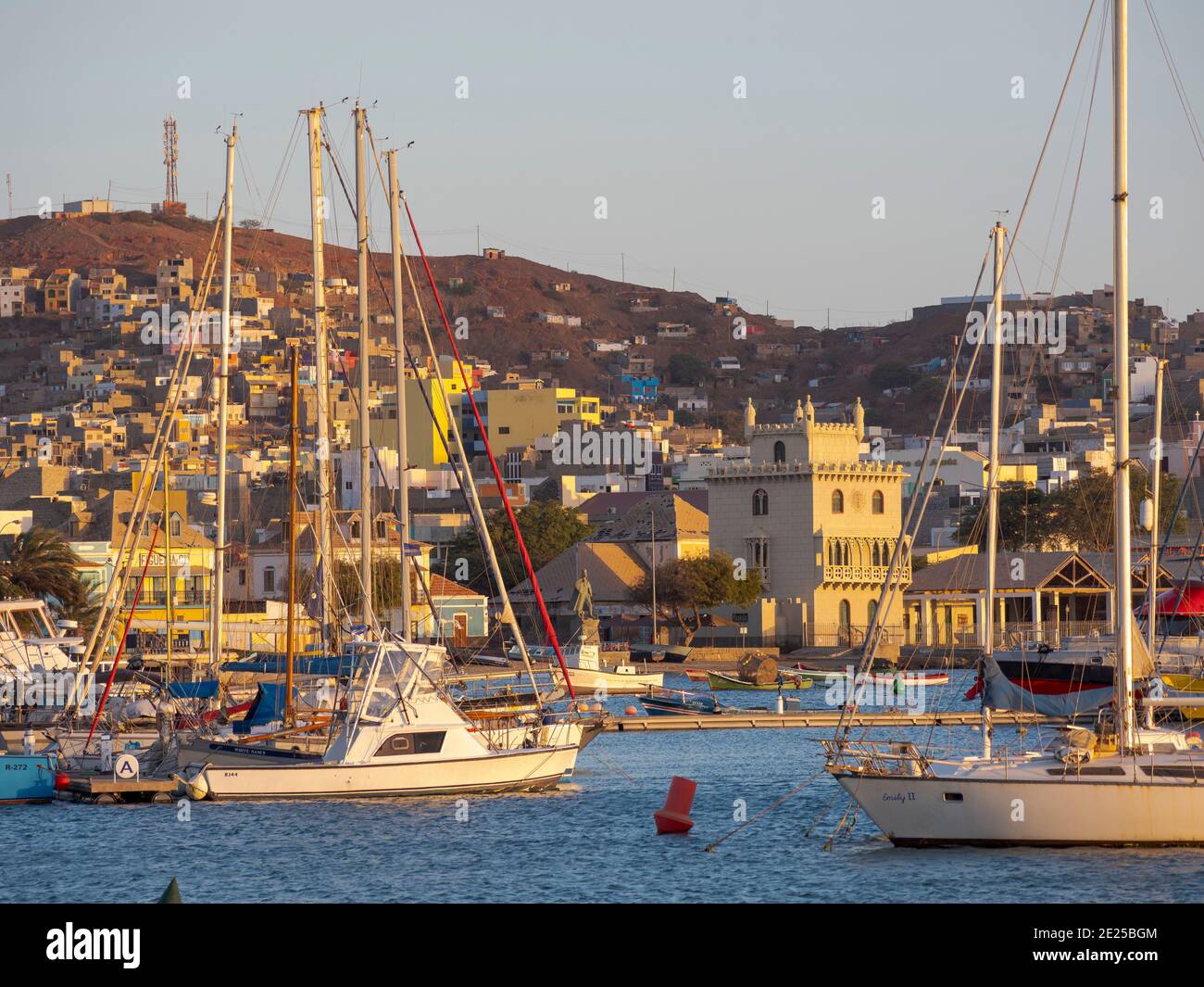 The harbour with marina and yachts during dawn. City Mindelo, a seaport ...