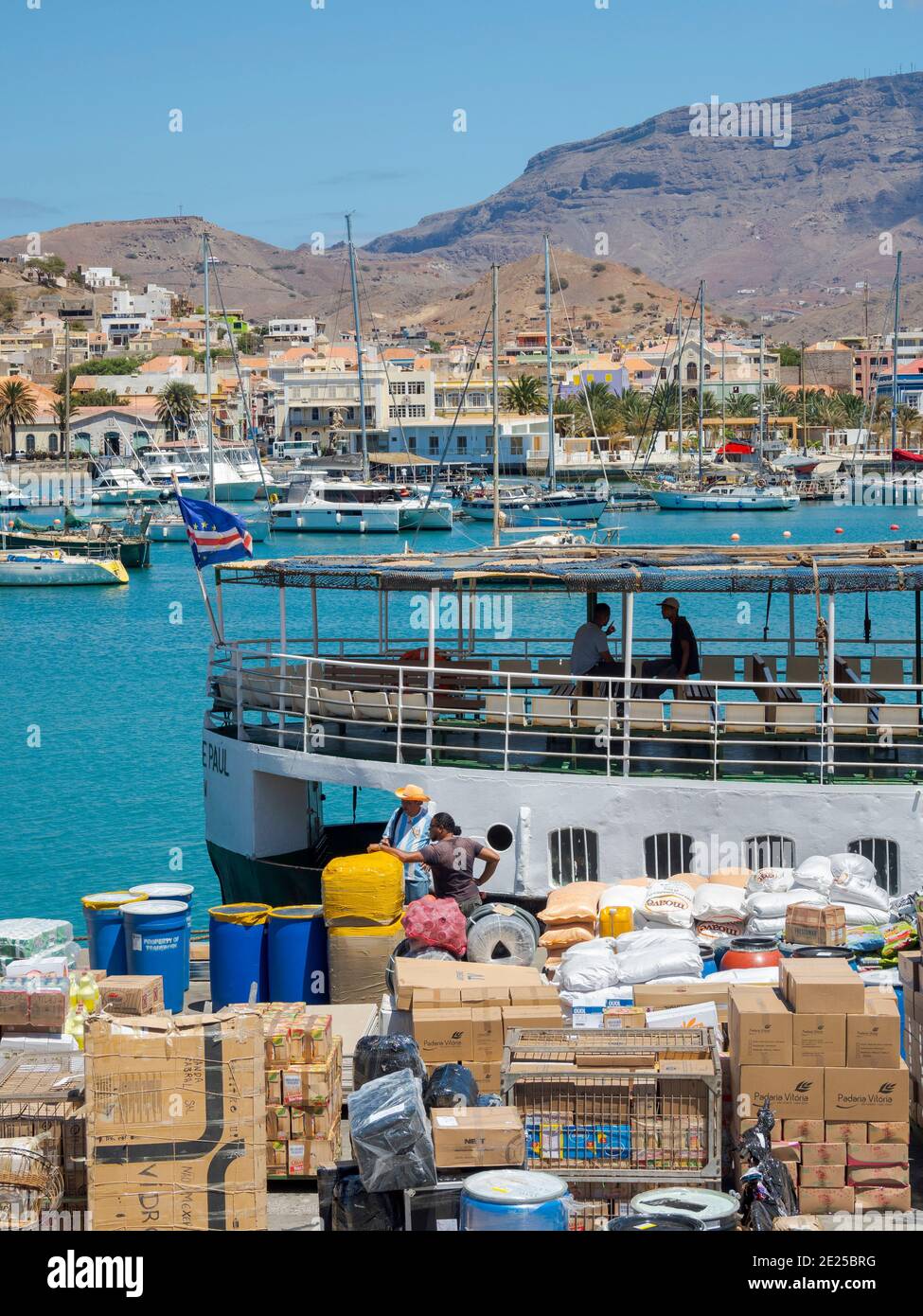 The harbor, a ship is loaded. City Mindelo, a seaport on the island Sao ...