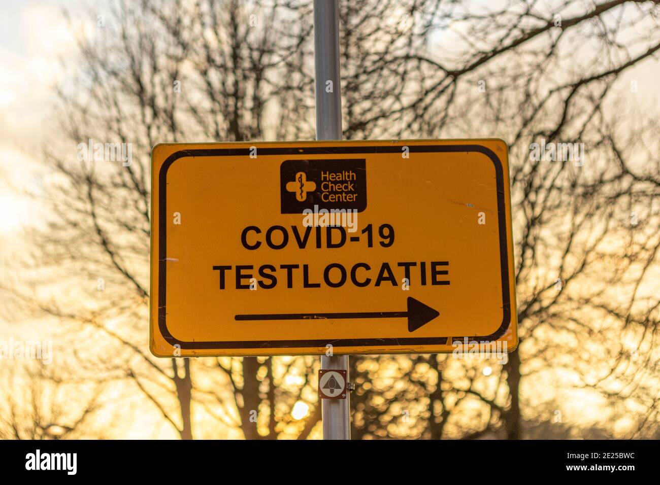 Sign towards COVID-19 test location Stock Photo - Alamy