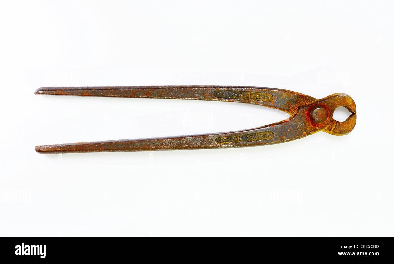 old rusty pliers on white Stock Photo - Alamy