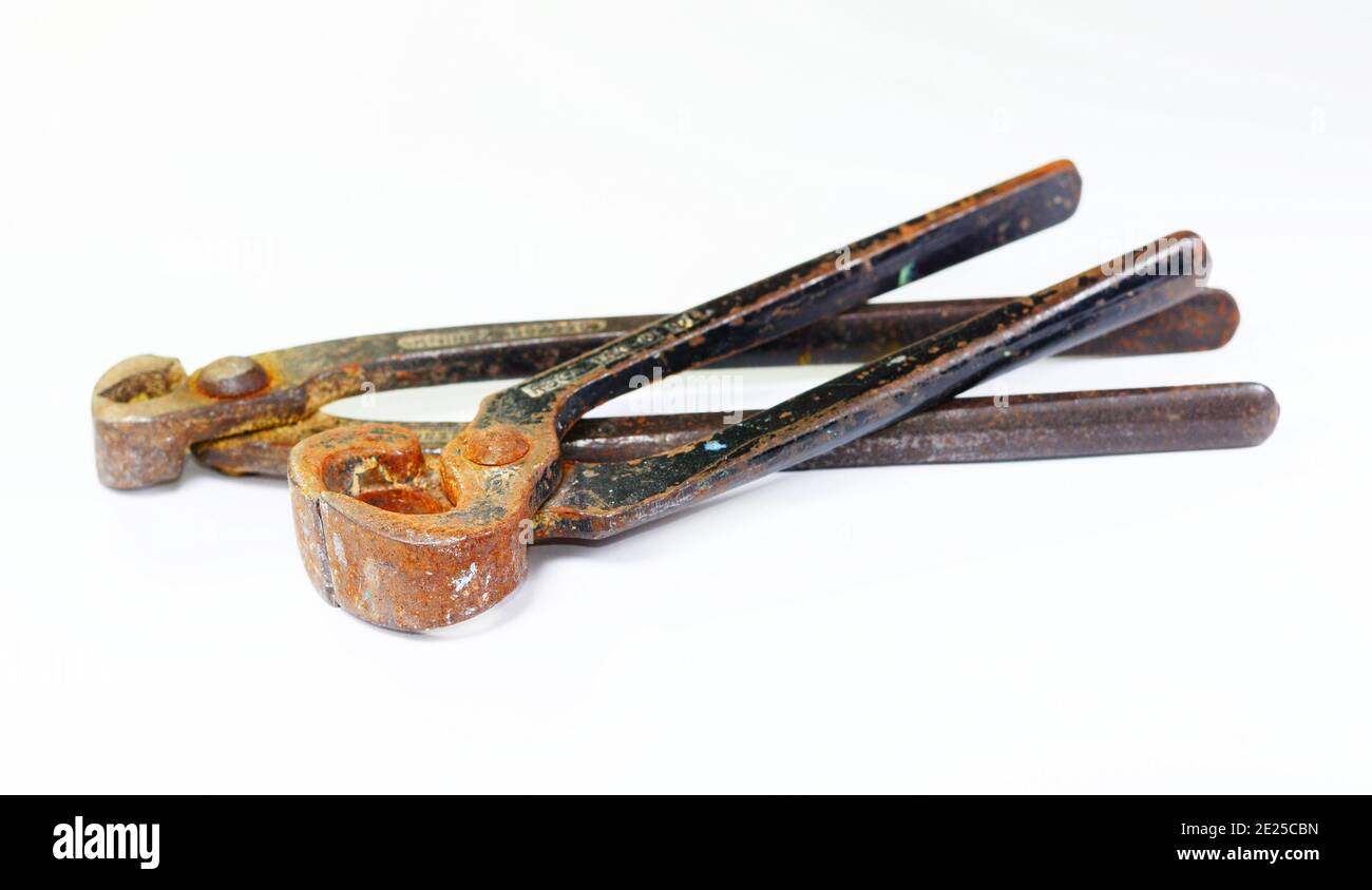 old rusty pliers on white Stock Photo - Alamy