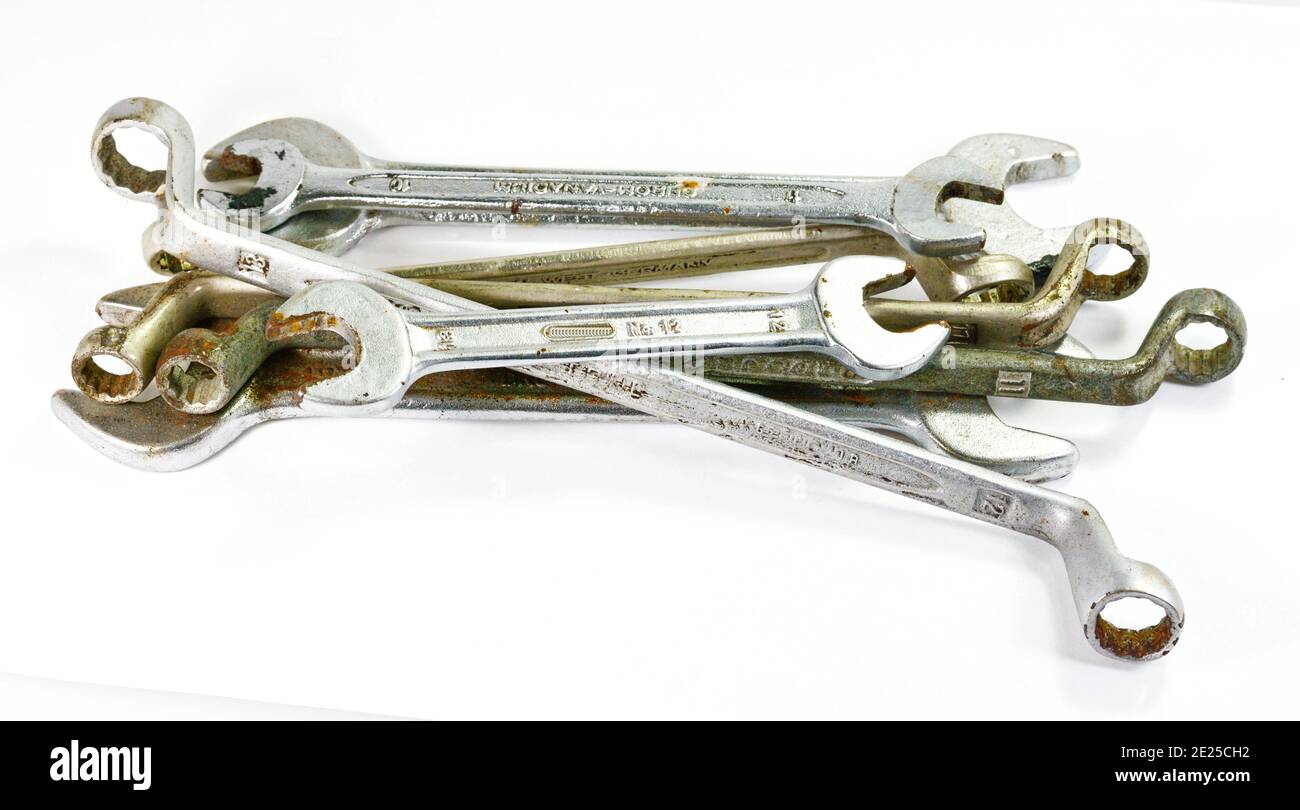 Old rusty wrench on white background Stock Photo - Alamy