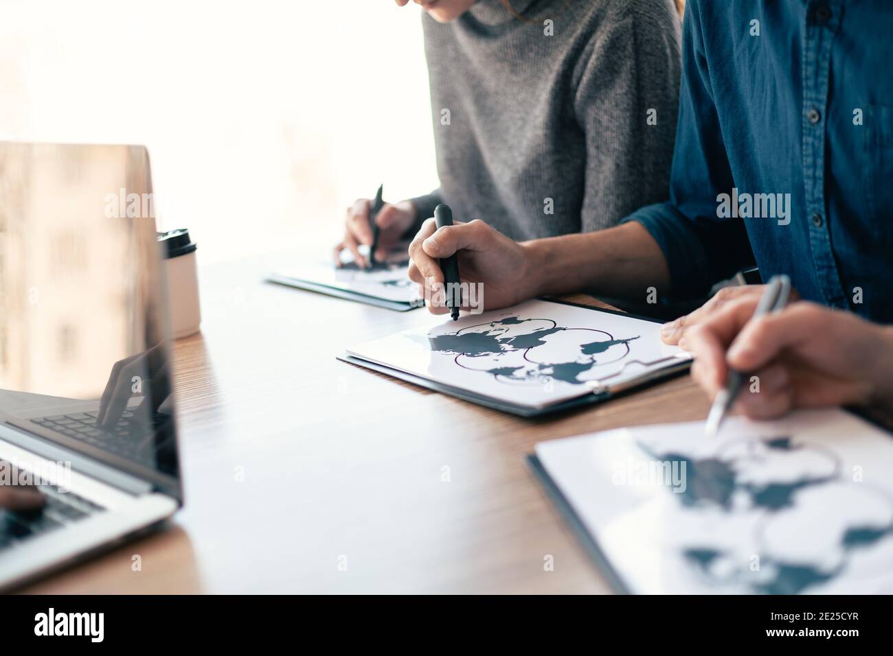 Elements of this image furnished by NASA. business team checking the ...